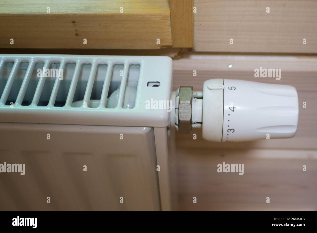 a heating radiator with the ability to adjust the temperature is ...