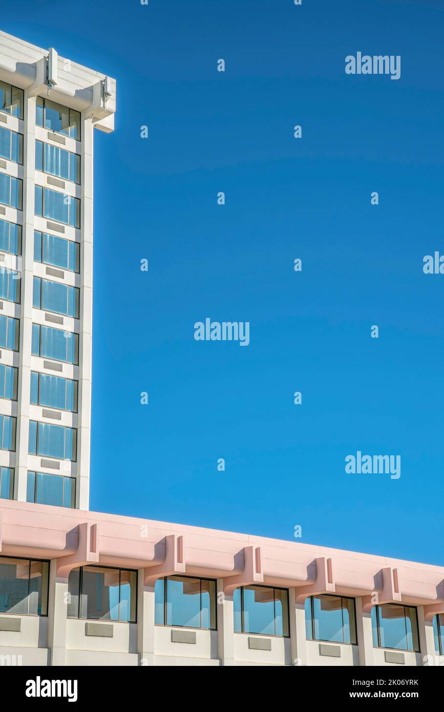 Fragment of modern residential building with clear blue sky view in ...