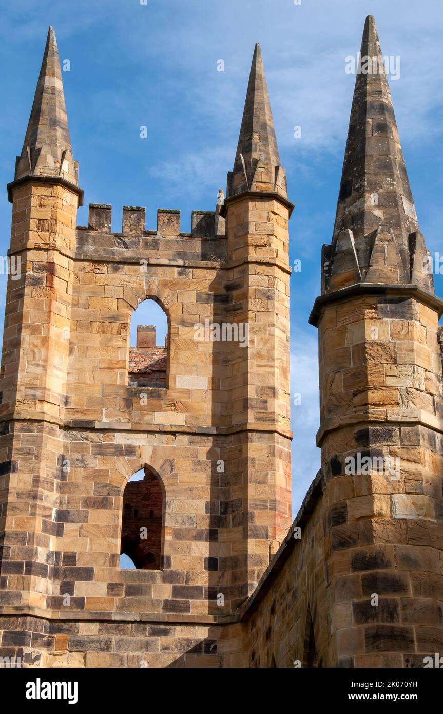 Port Arthur Australia, exterior of tower in church ruins against blue ...