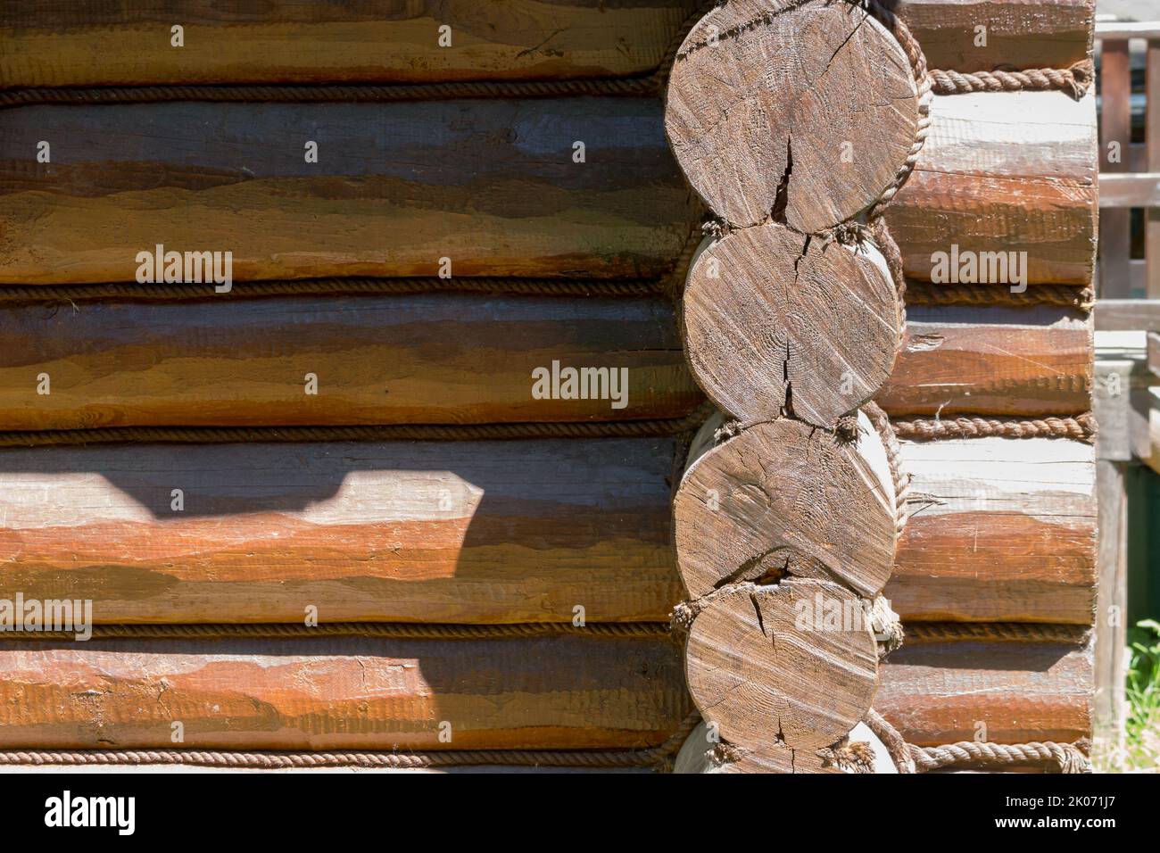 the cottage is made of wooden beams. Eco-friendly log house. Close-up ...