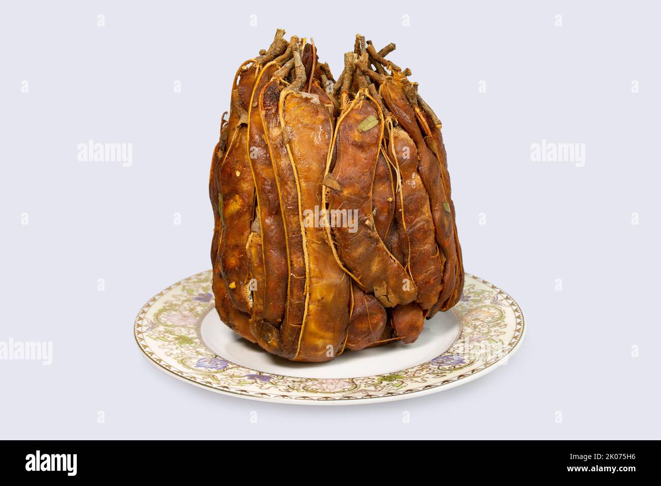 Ripe peeled Tamarind stack on white background. Scientific name ...