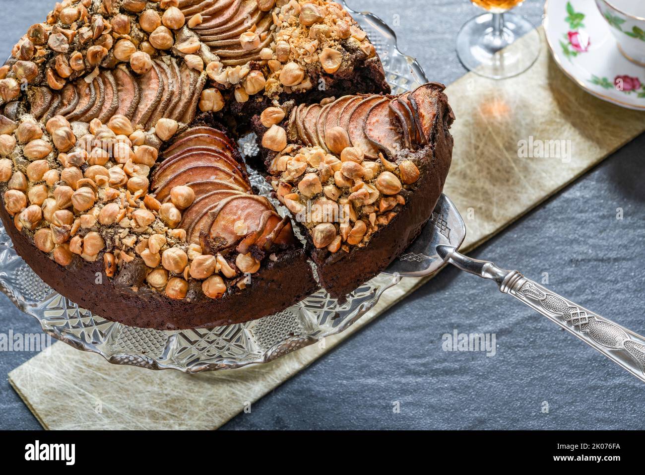 Moist chocolate, pear and golden hazelnut torte Stock Photo - Alamy