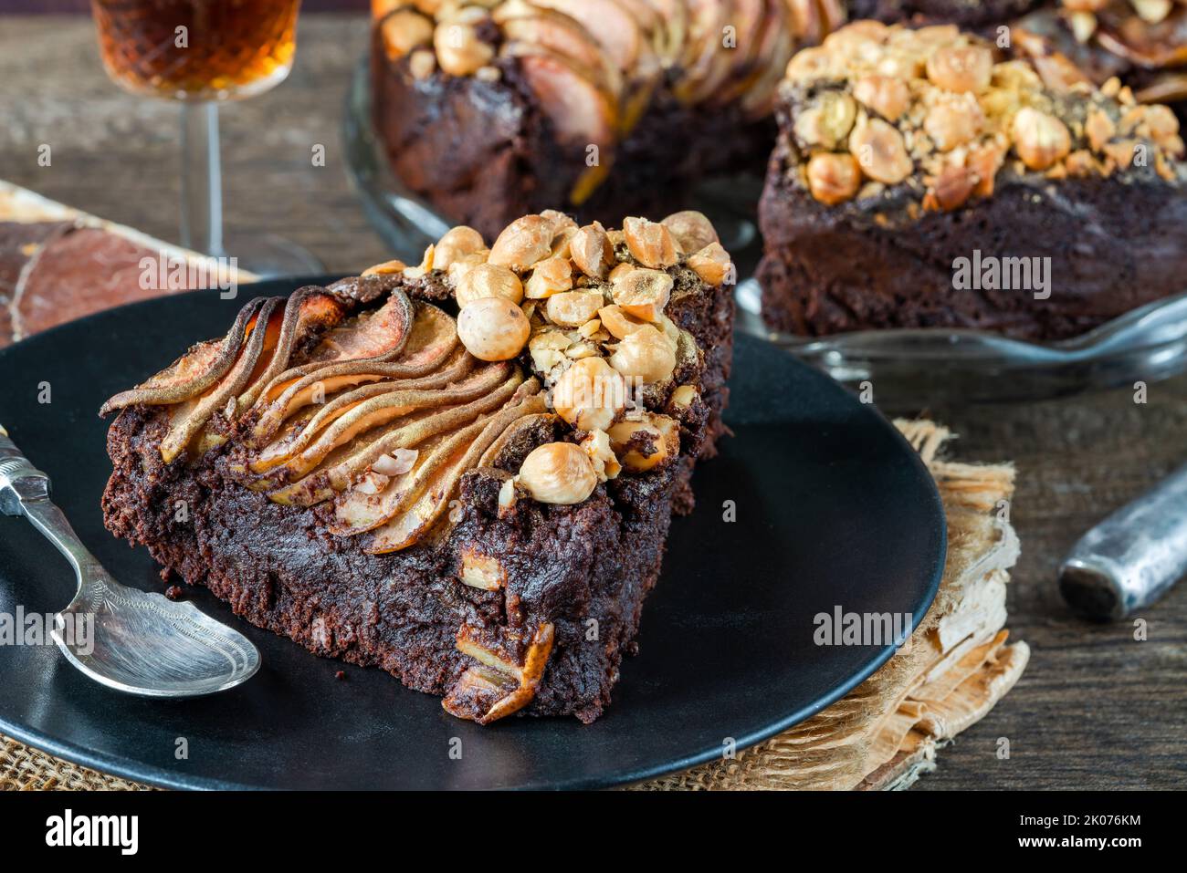 Moist chocolate, pear and golden hazelnut torte Stock Photo - Alamy