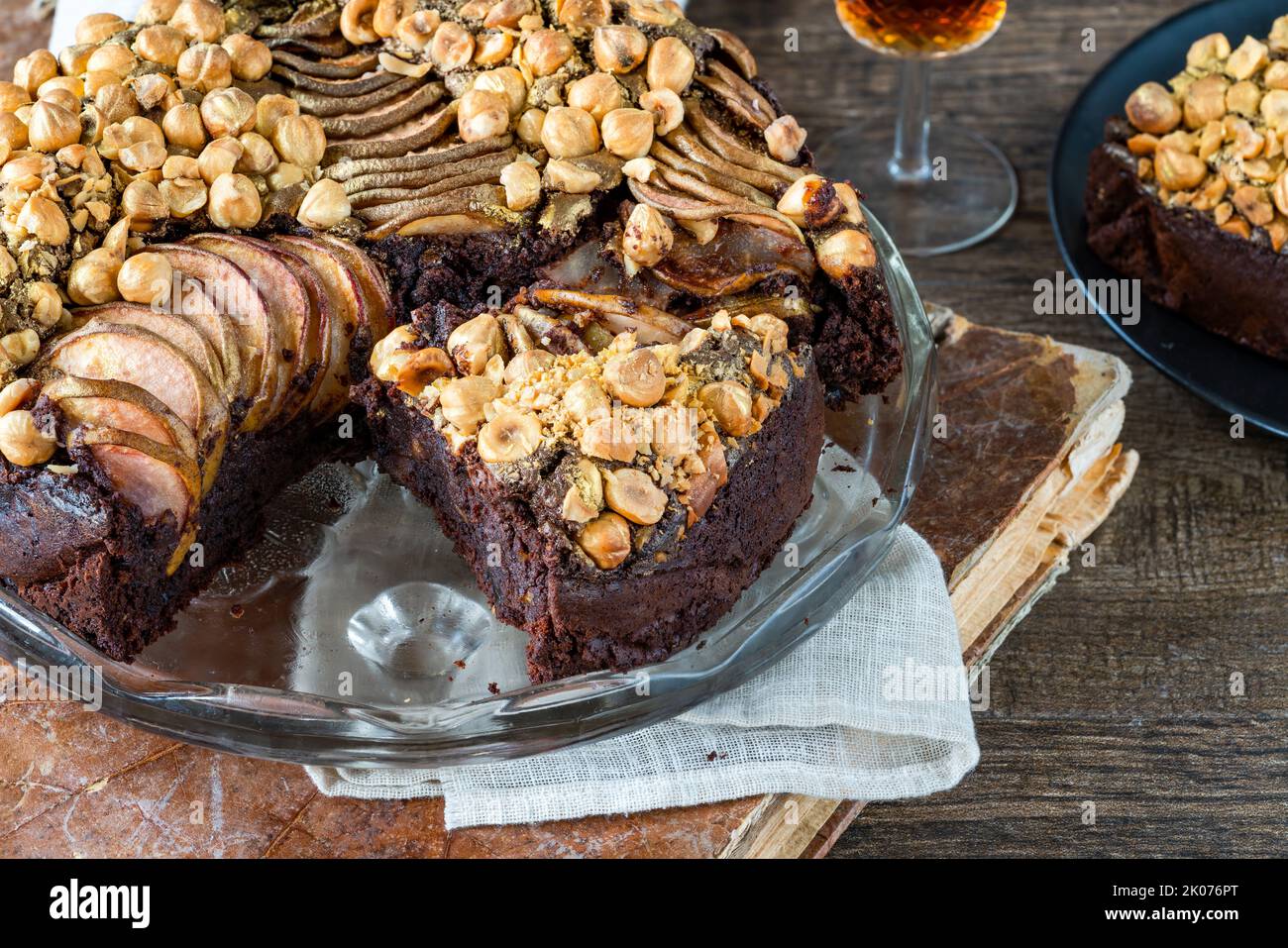 Moist chocolate, pear and golden hazelnut torte Stock Photo - Alamy