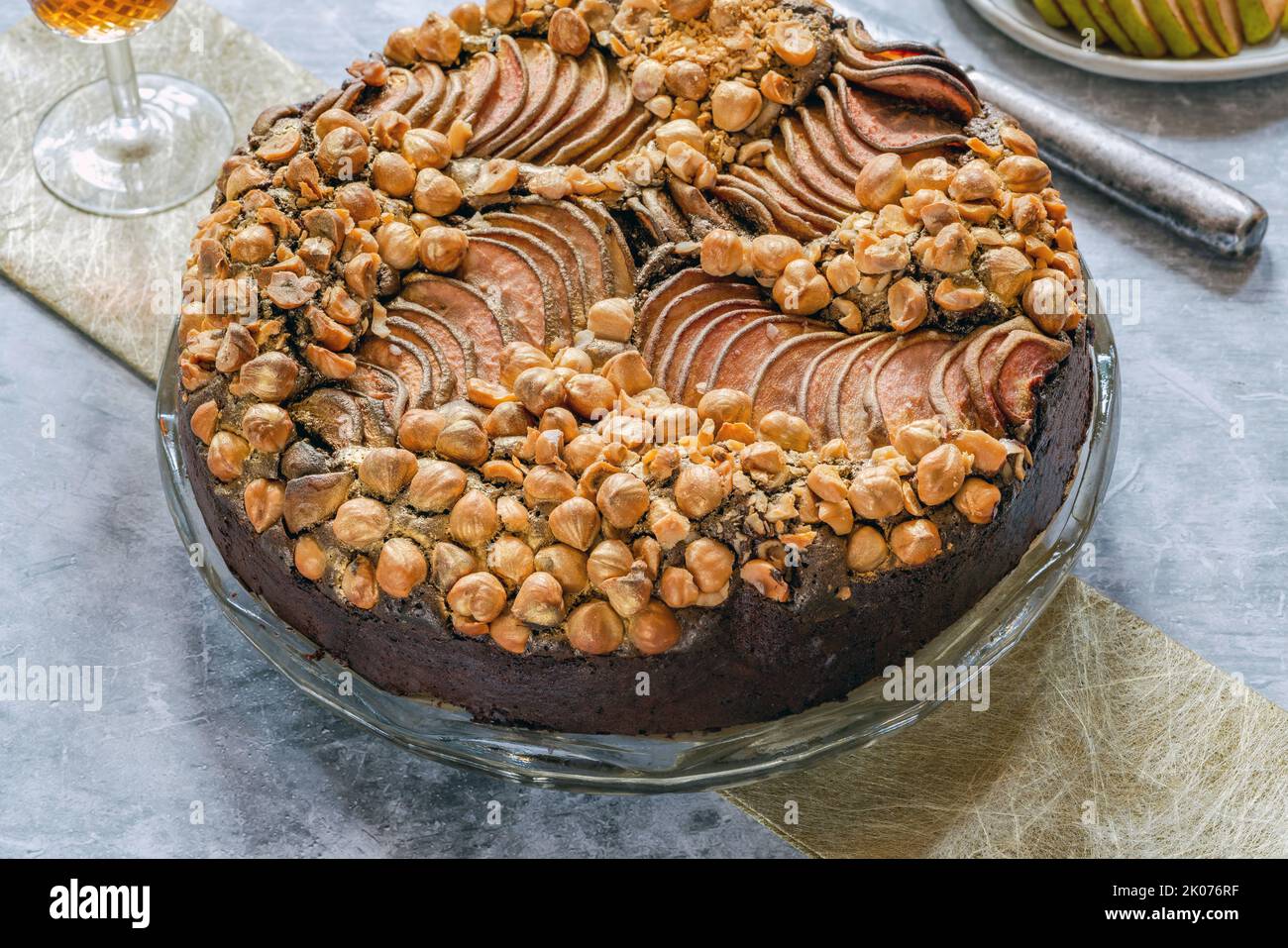 Moist chocolate, pear and golden hazelnut torte Stock Photo - Alamy