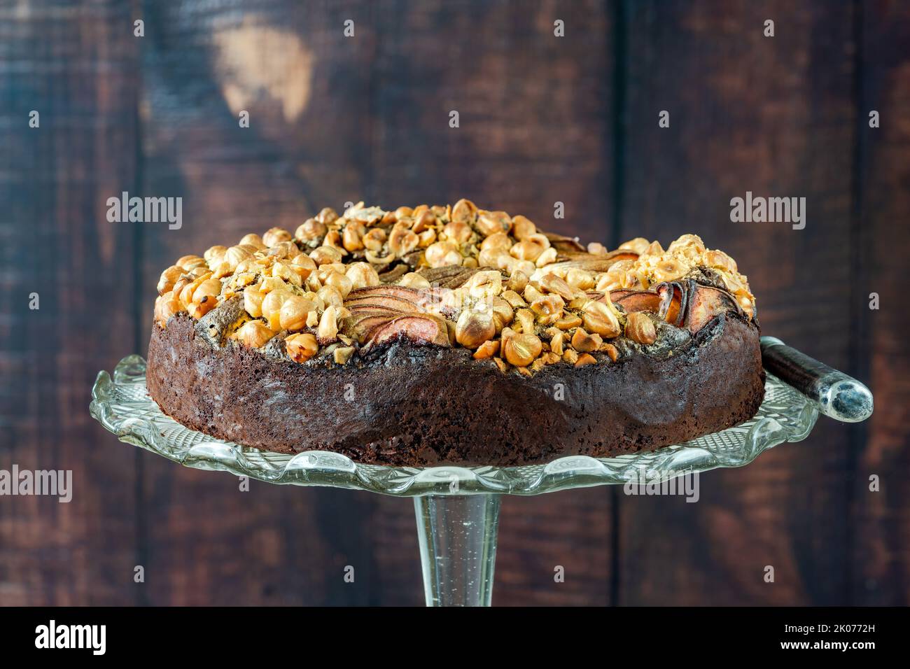 Moist chocolate, pear and golden hazelnut torte Stock Photo - Alamy