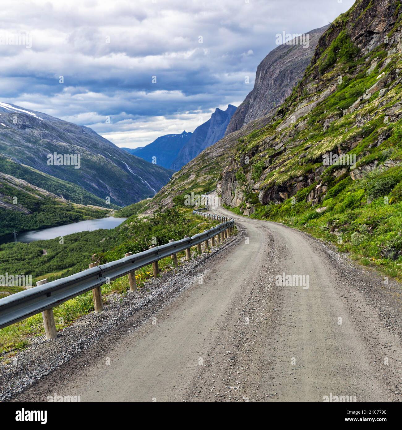 Gravel road through typical mountain landscape, impressive landscape ...