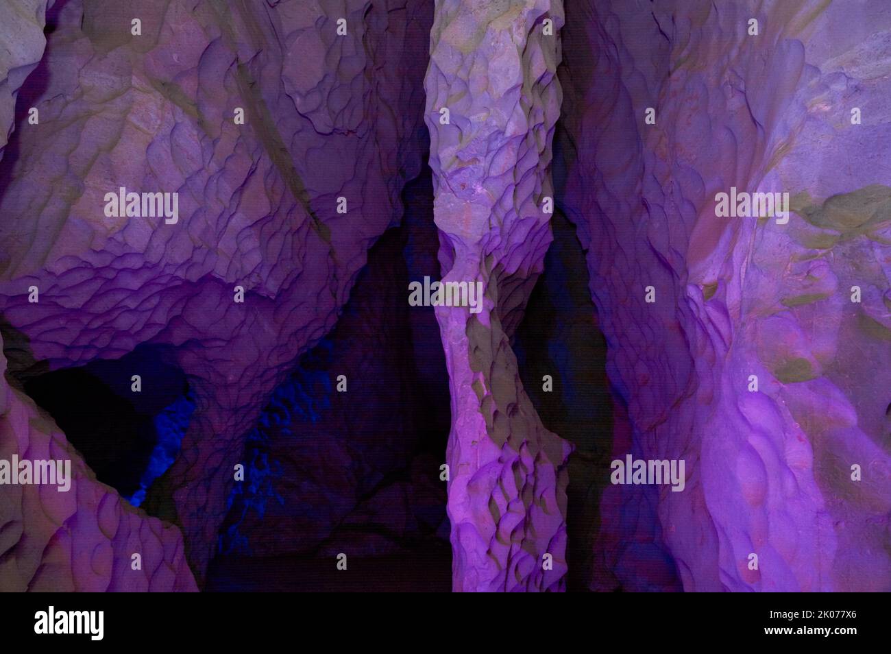 Vaults of the cave Tale from within, with purple illumination Stock ...