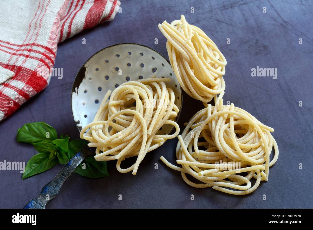 Pici, Italian pasta, pasta nests with sieve ladle, pasta, noodles Stock ...