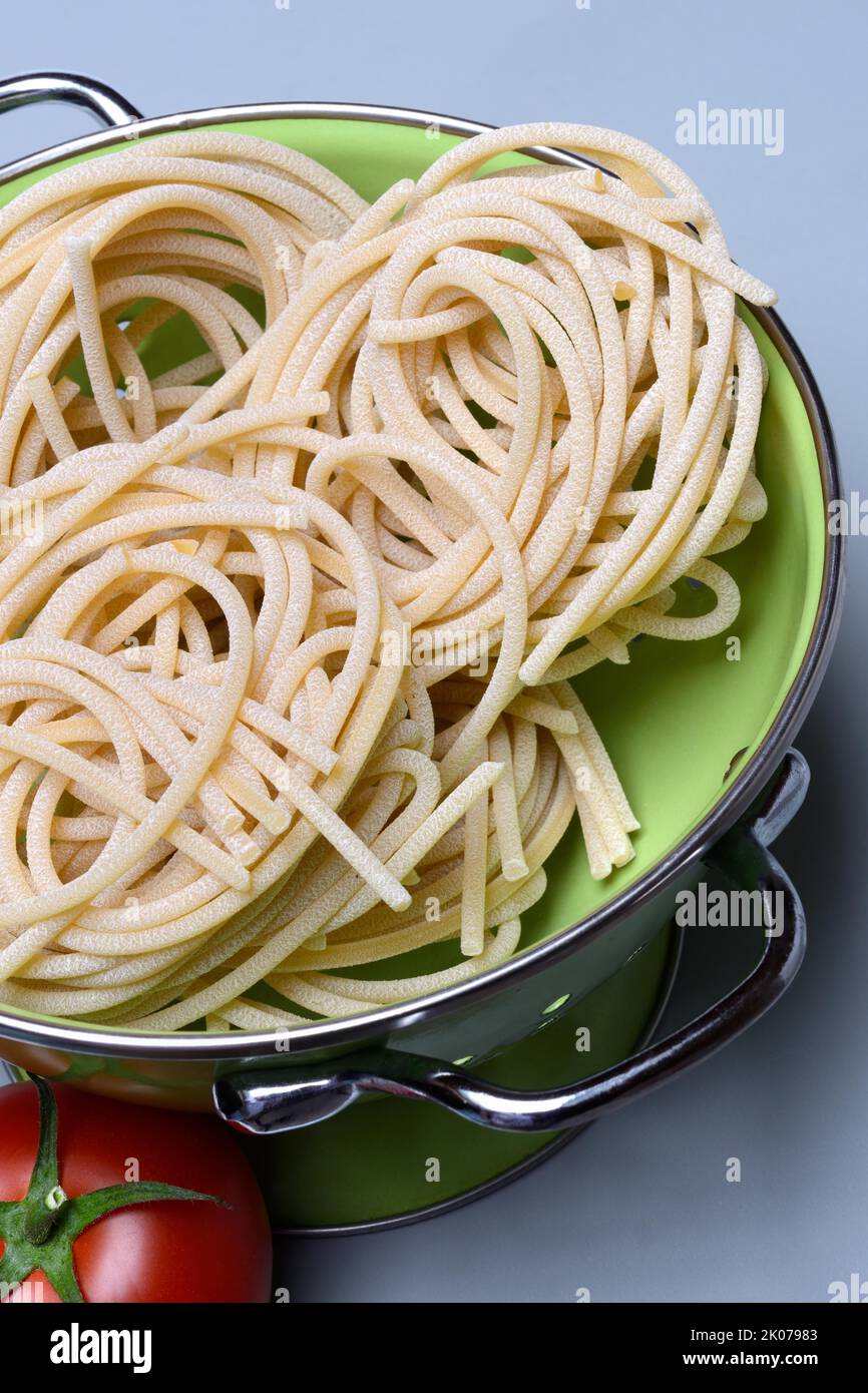 Pici pasta in kitchen colander, pasta nests, pasta, noodles, Italy ...
