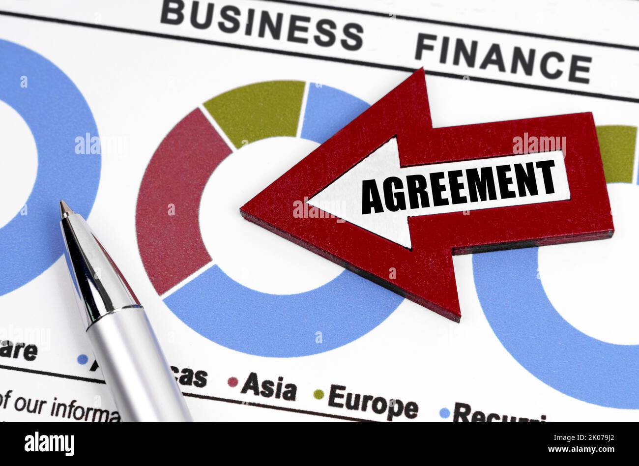 Business concept. Against the background of the diagrams, an arrow with ...