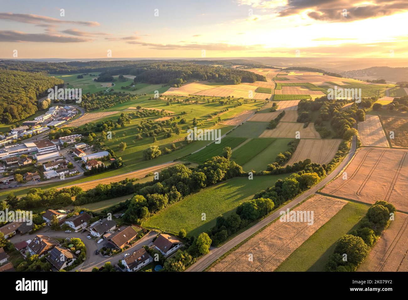 Aerial view of a village edge with distant view of beautiful nature at ...