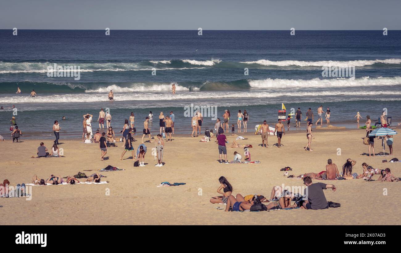 Gold Coast, Queensland, Australia - People sunbaking and swimming in ...
