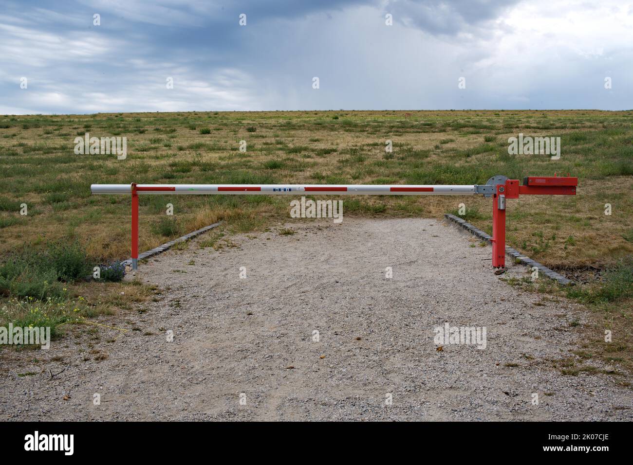 A barrier prevents people from entering a landfill site, Grossziethen ...