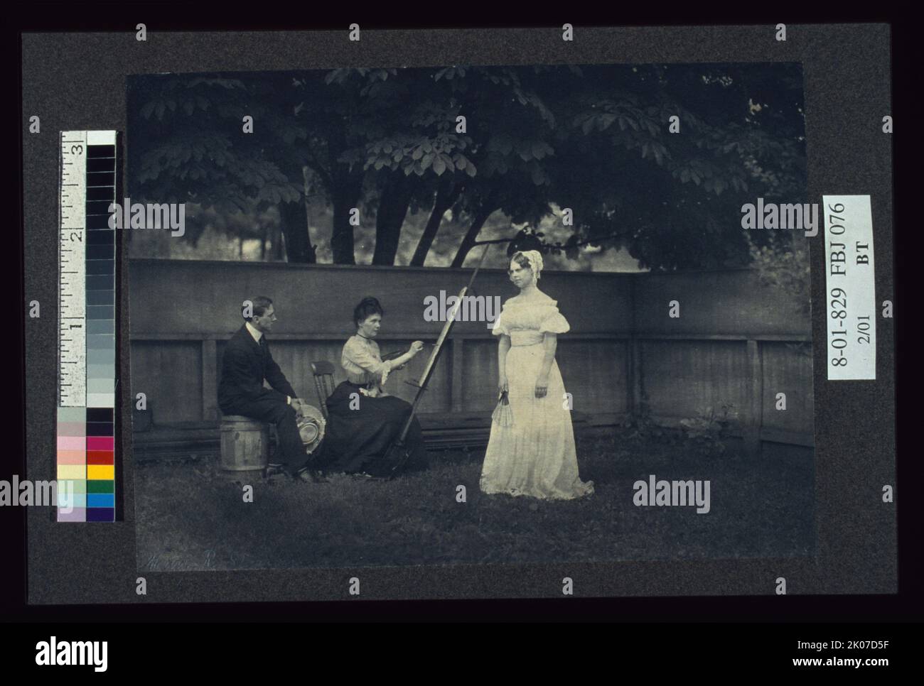 Good model, 1901. Photograph shows a young woman dressed in a white ...
