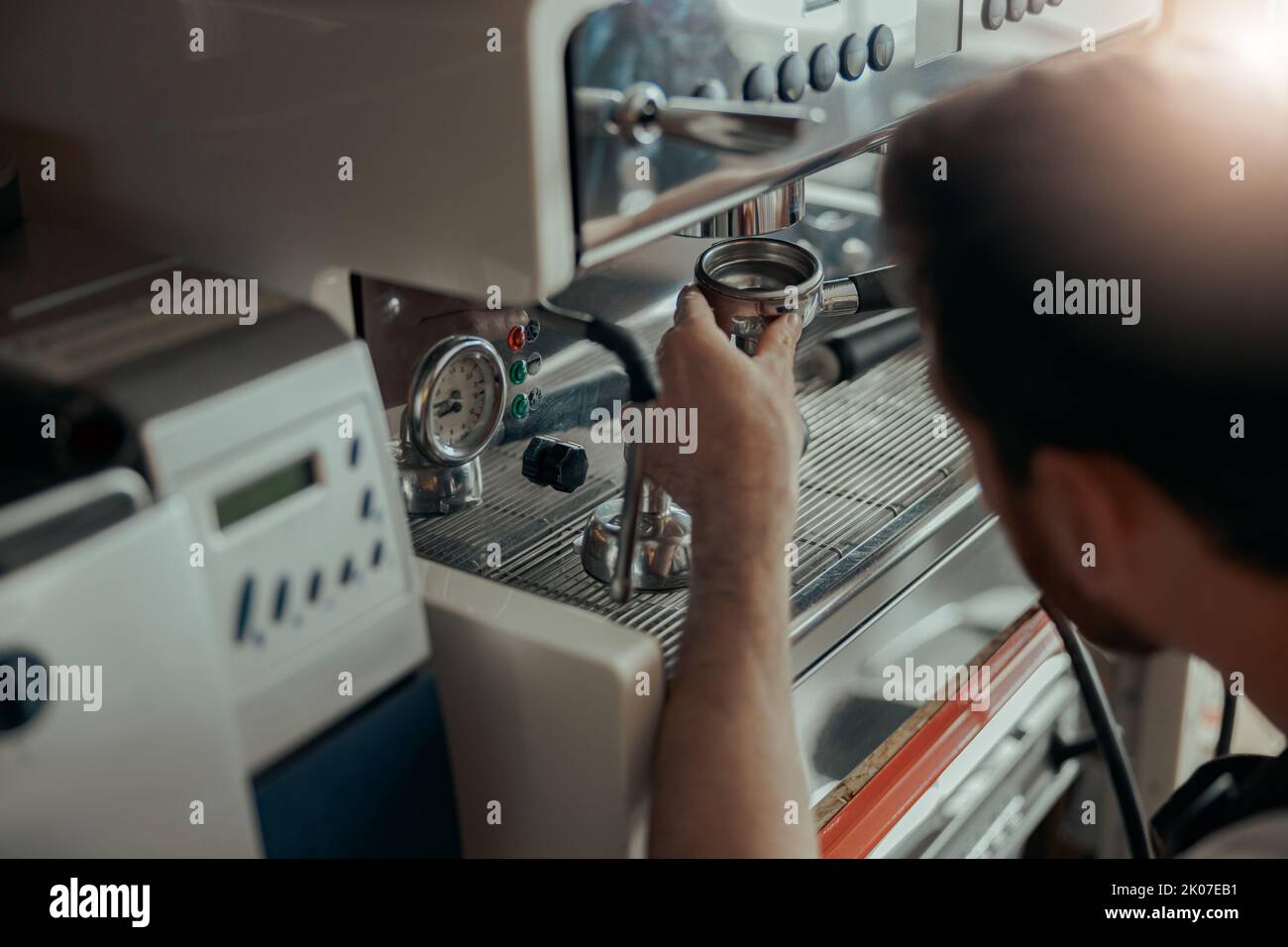 Man fixing coffee machine hi-res stock photography and images - Alamy