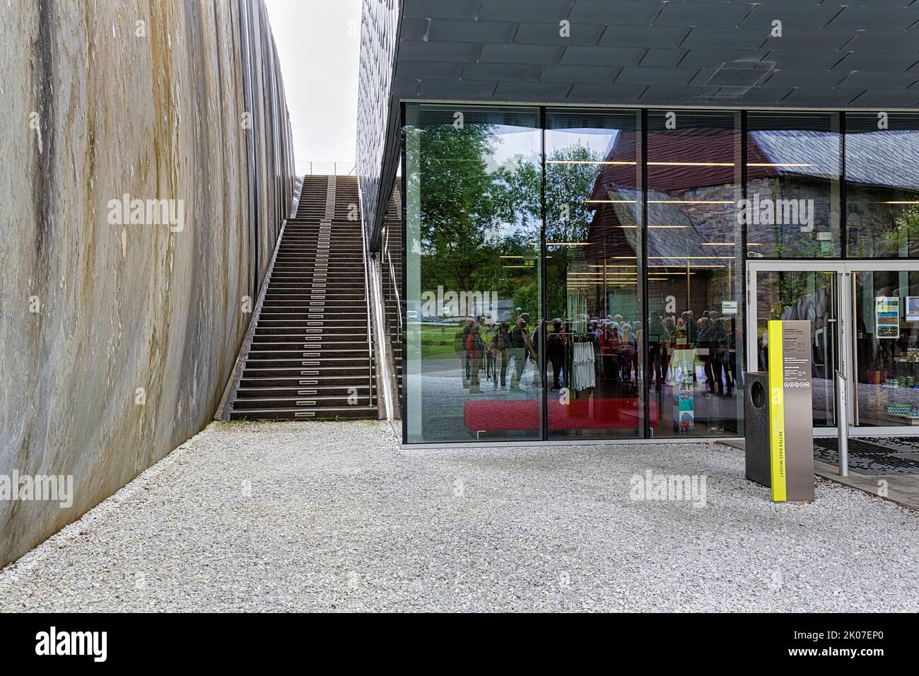 Visitors reflected in glass facade, Petter Dass Museum, Sandnessjoen ...