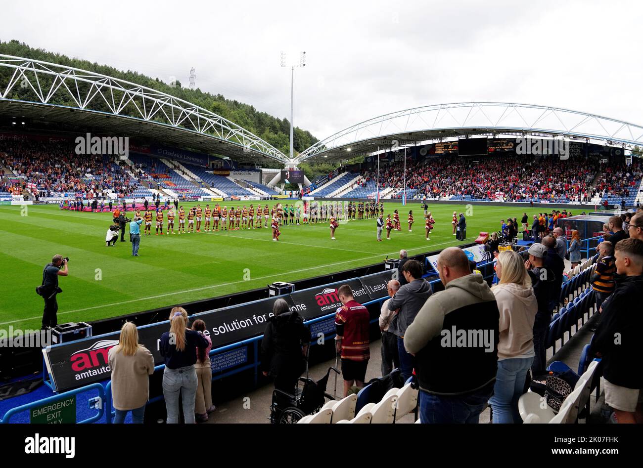 The players and officials observe a minute's silence following the ...