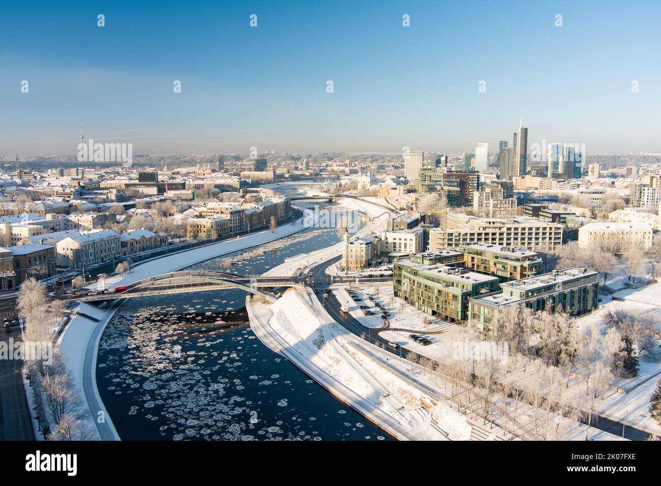 Beautiful Vilnius city panorama in winter with snow covered houses ...