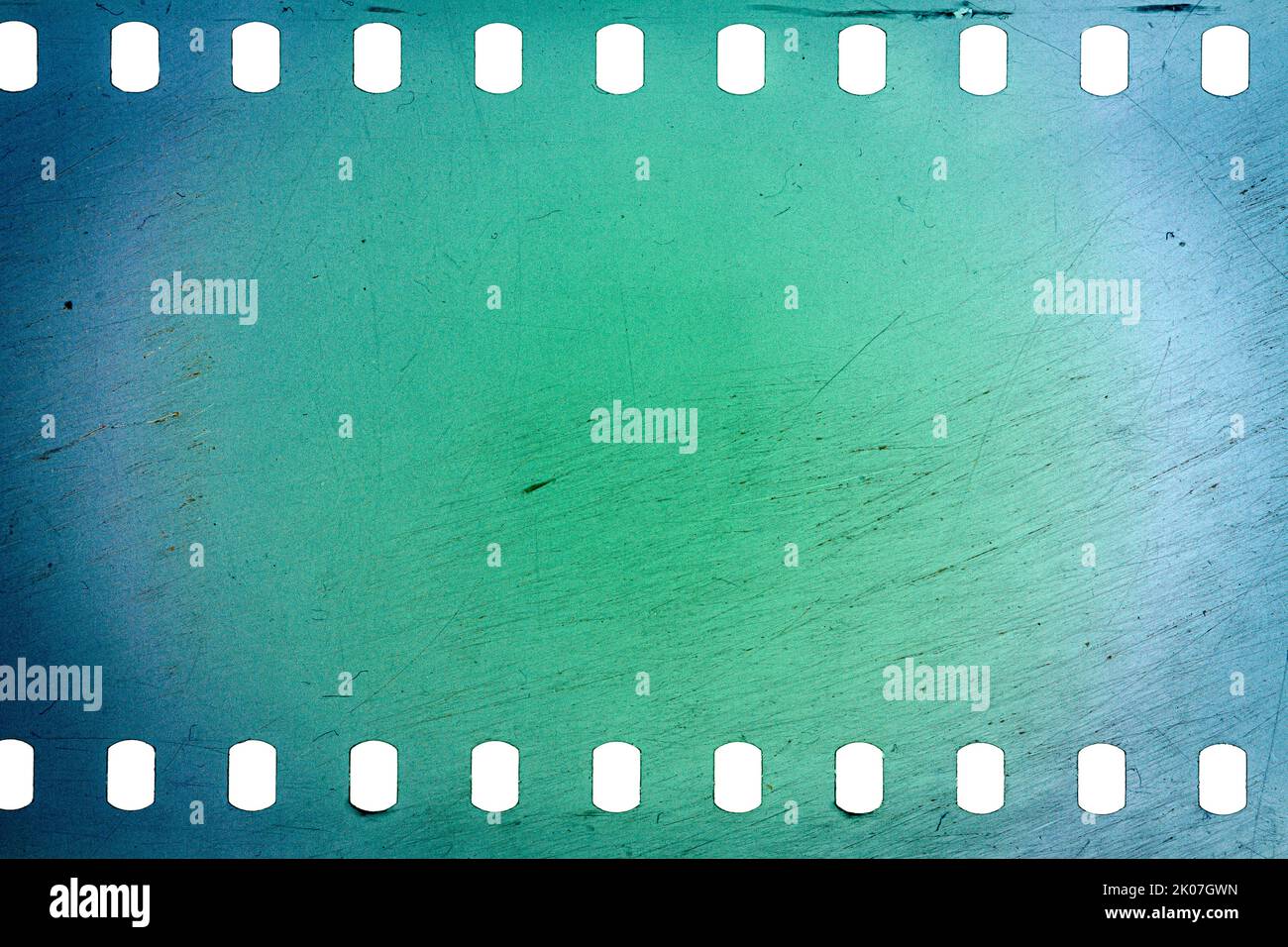 Dusty and grungy 35mm film texture or surface. Perforated scratched ...