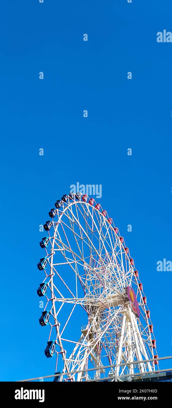 Ferris wheel turning against sky hi-res stock photography and images ...