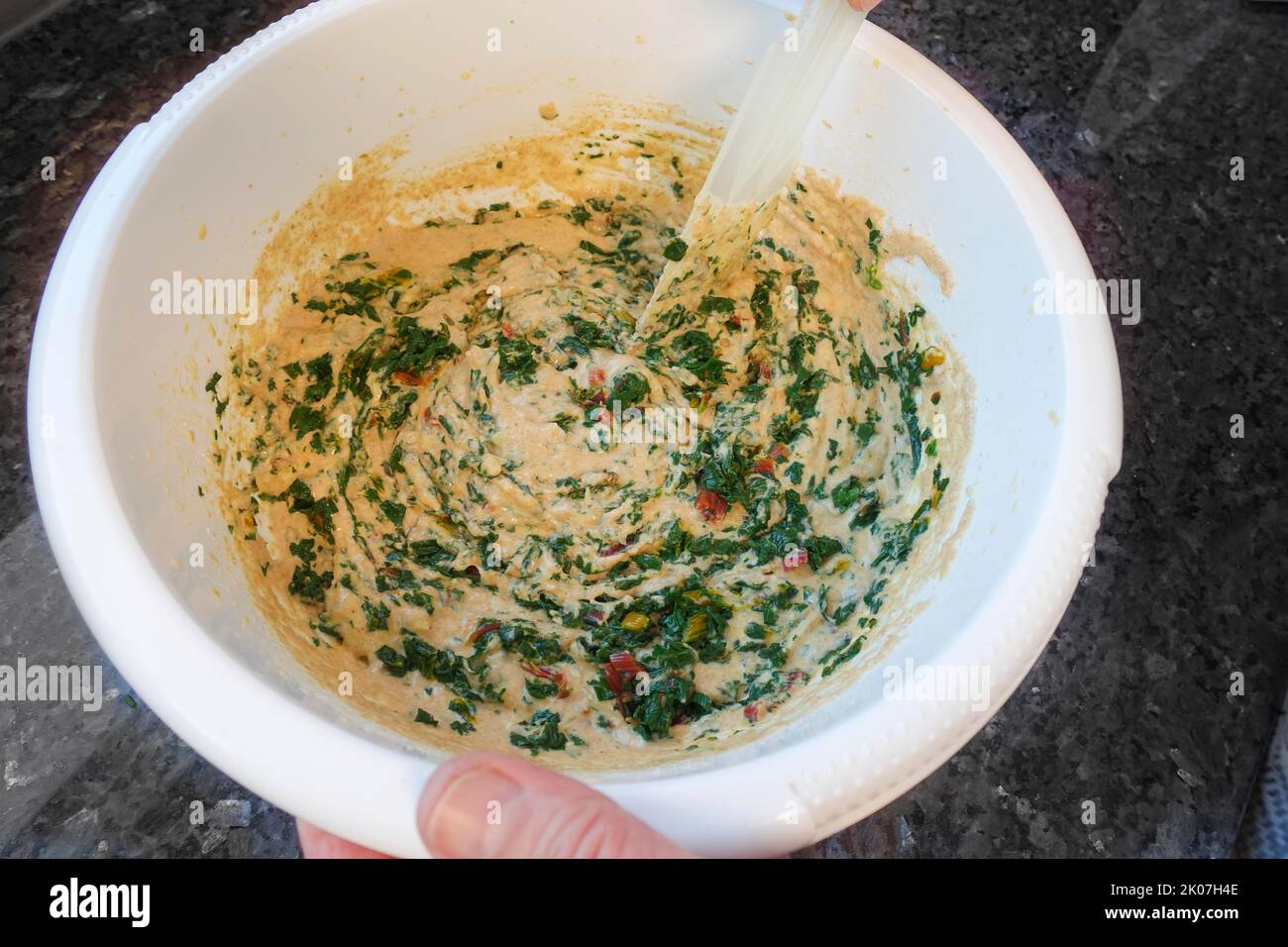 Swabian cuisine, preparation of chard cake, stirring chard into dough ...