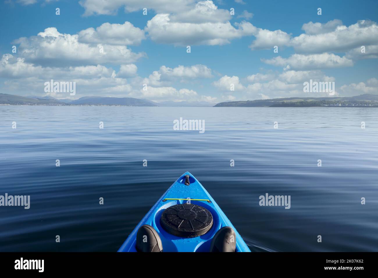 Kayak on peaceful calm water on the Firth of Clyde Scotland Stock Photo ...