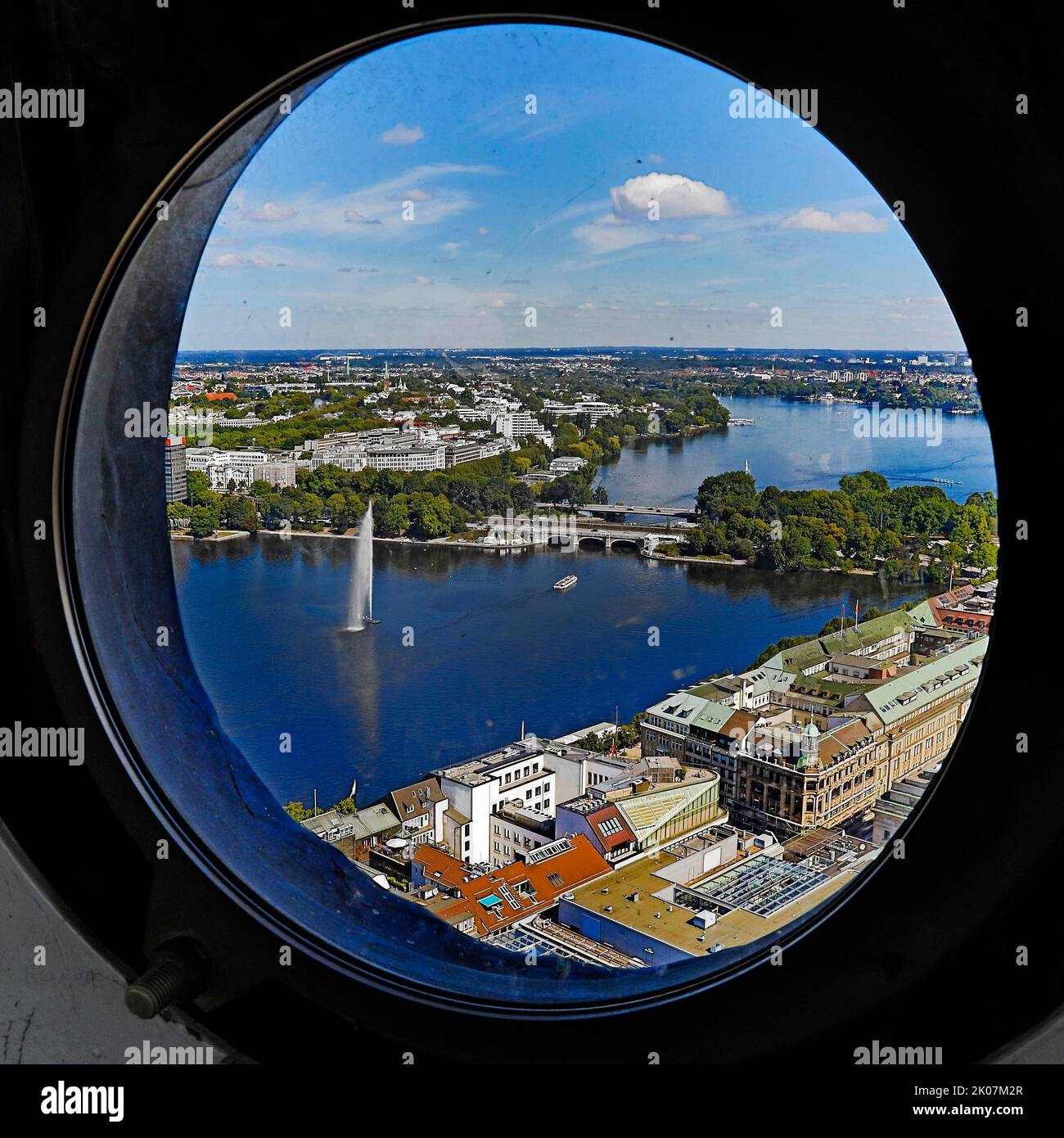City view of the Inner Alster Lake through the porthole windows in the ...