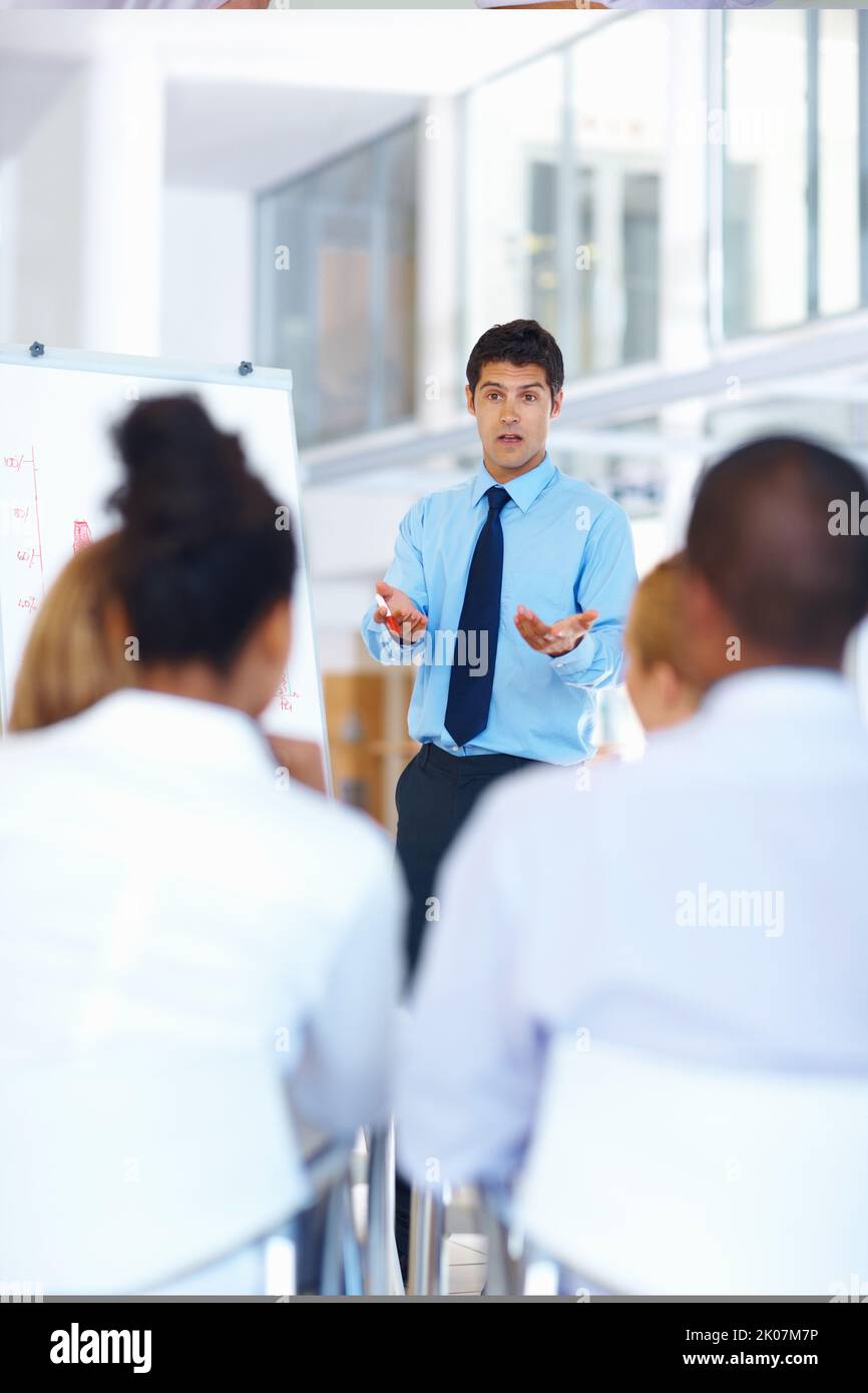 Business partnership. Low angle view of multi ethnic business team ...