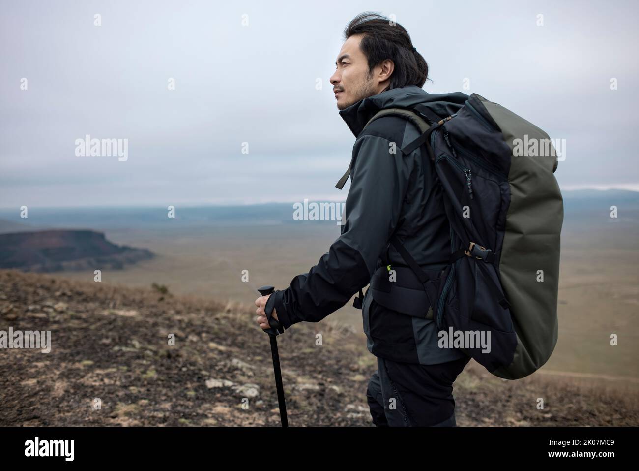 Chinese mid adult man hiking outdoors Stock Photo - Alamy