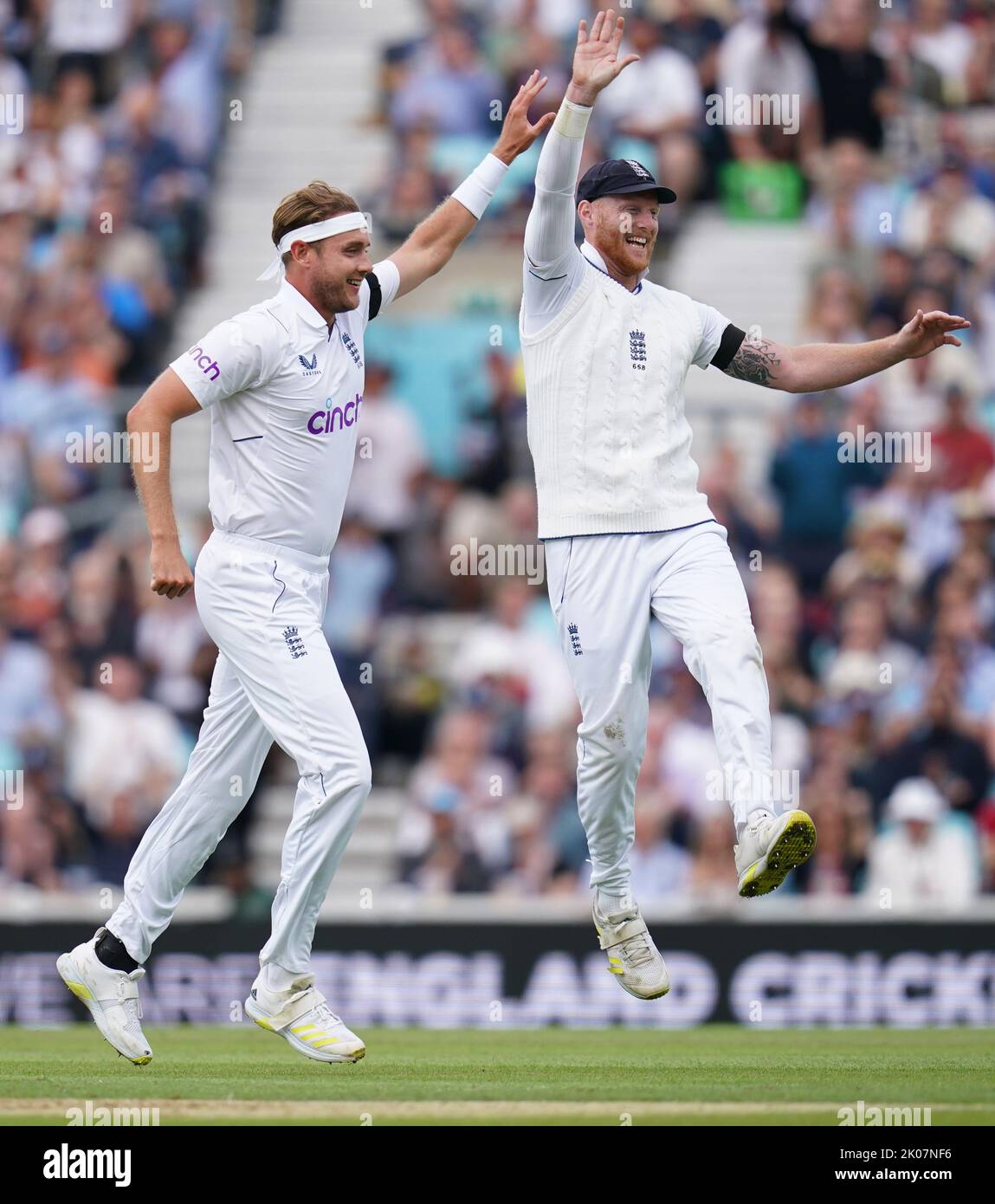 England's Stuart Broad (left) celebrates with Ben Stokes after taking ...