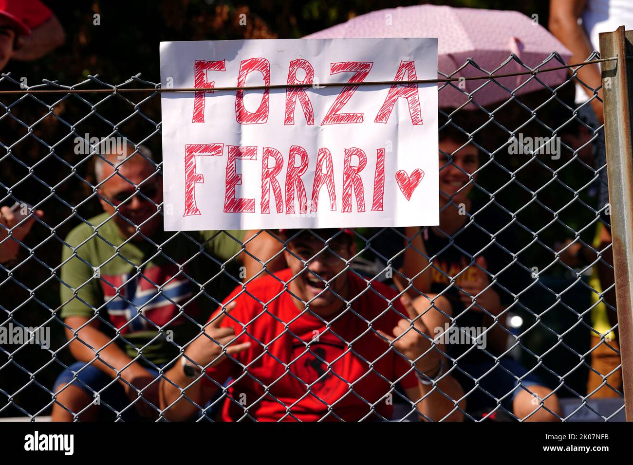 A fan with a Forza Ferrari sign during practice at the Monza circuit in ...