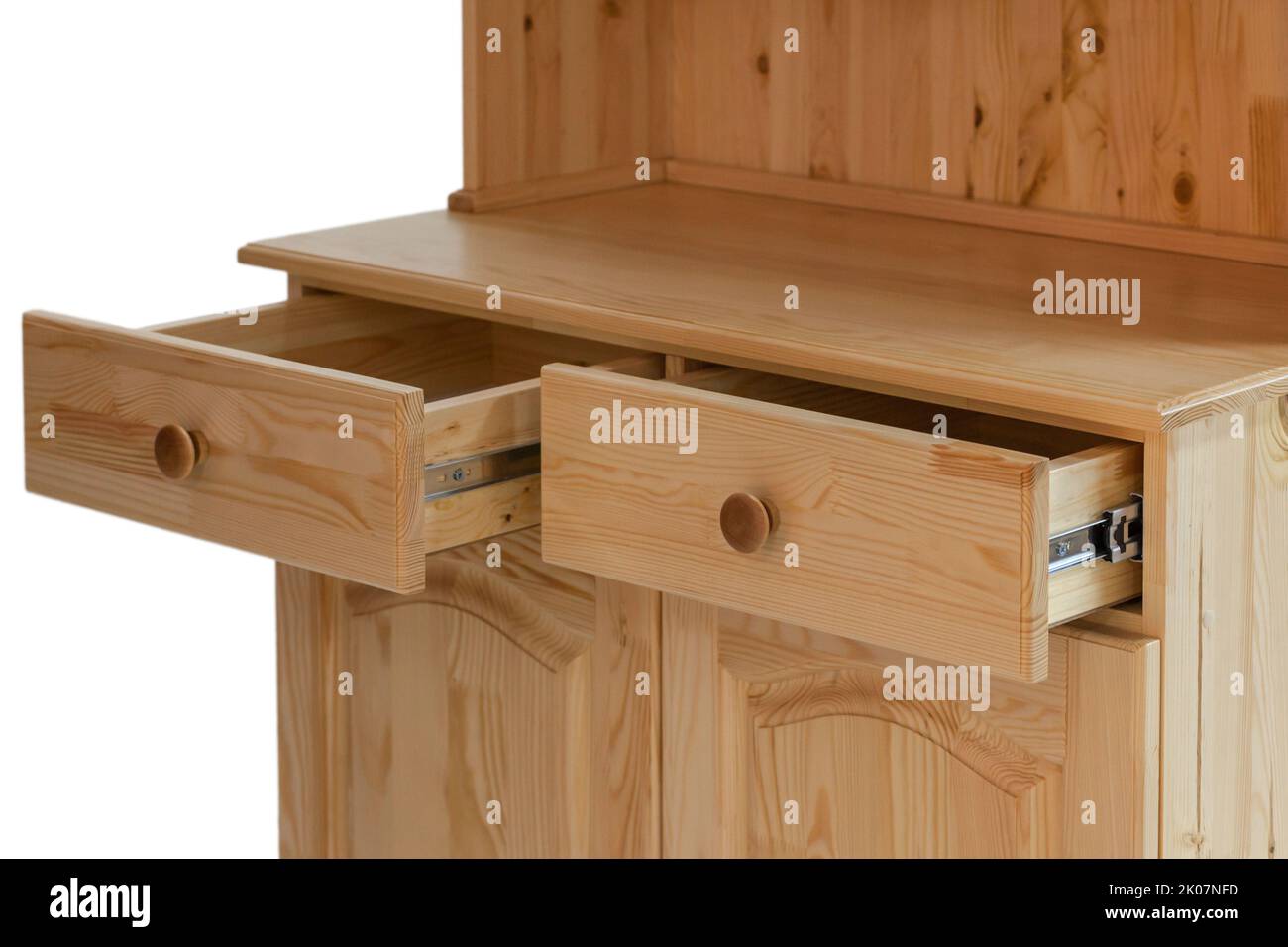 Open drawers of a wooden kitchen cabinet with shelves isolated on a ...