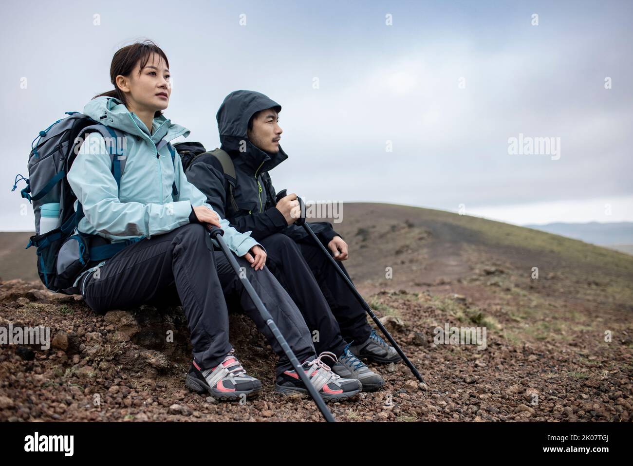 Happy Chinese couple hiking outdoors Stock Photo - Alamy