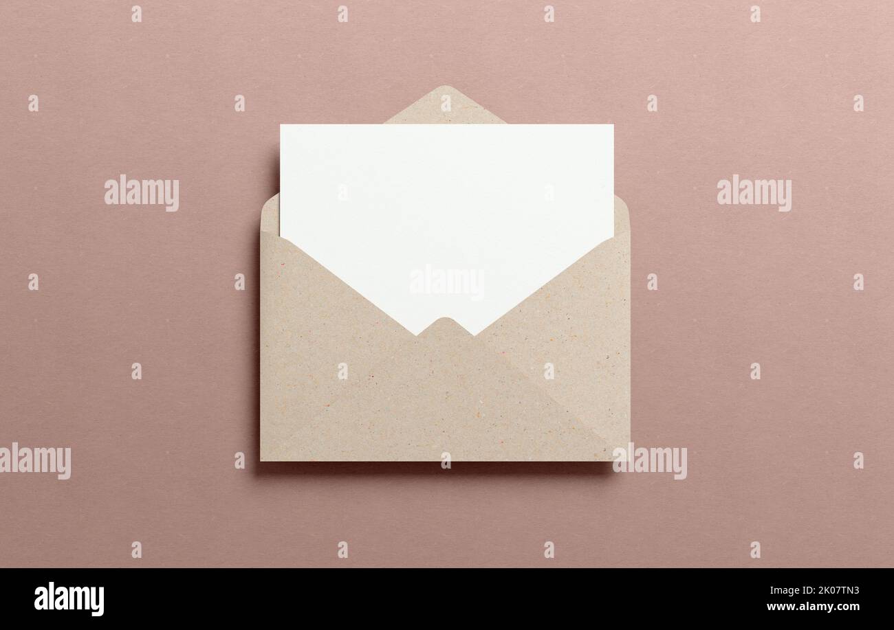 Postcard mockup blank paper inside an envelope template on a color ...