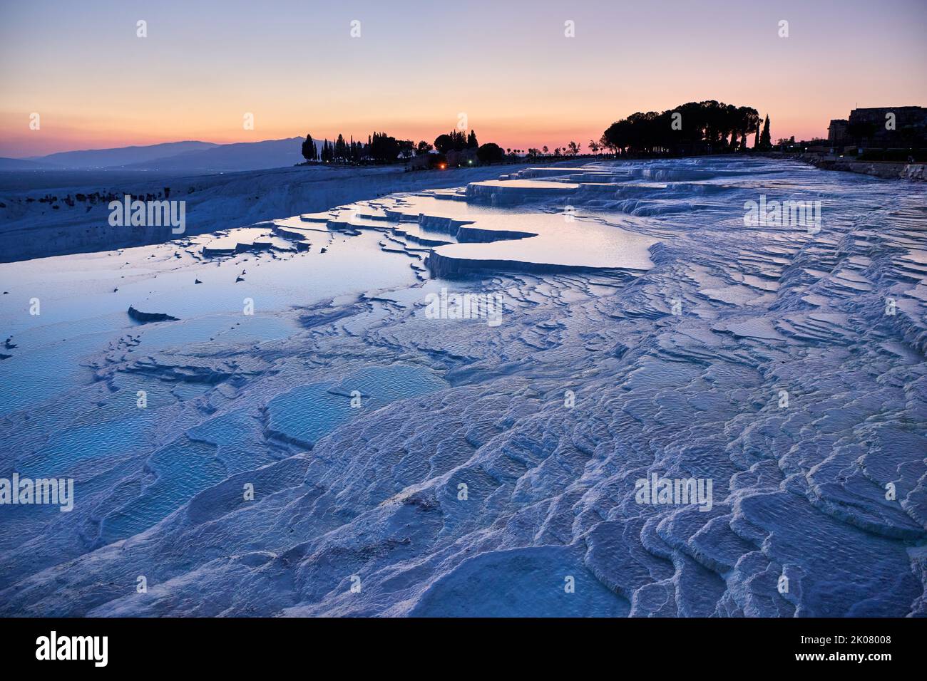 sunset behind Pamukkale travertine terraces, Denizli, Turkey Stock ...