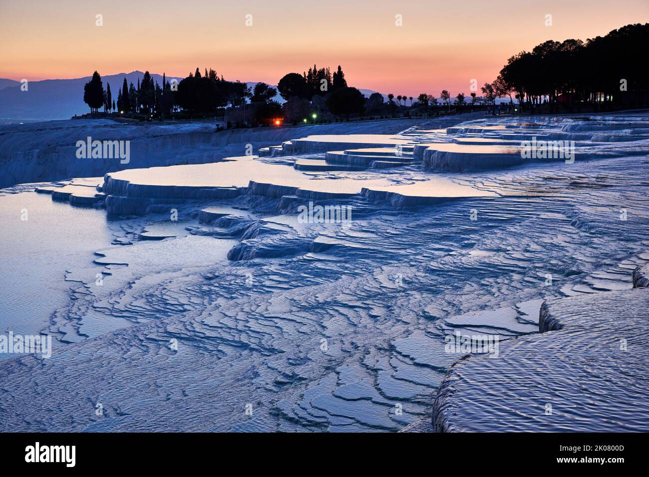 sunset behind Pamukkale travertine terraces, Denizli, Turkey Stock ...