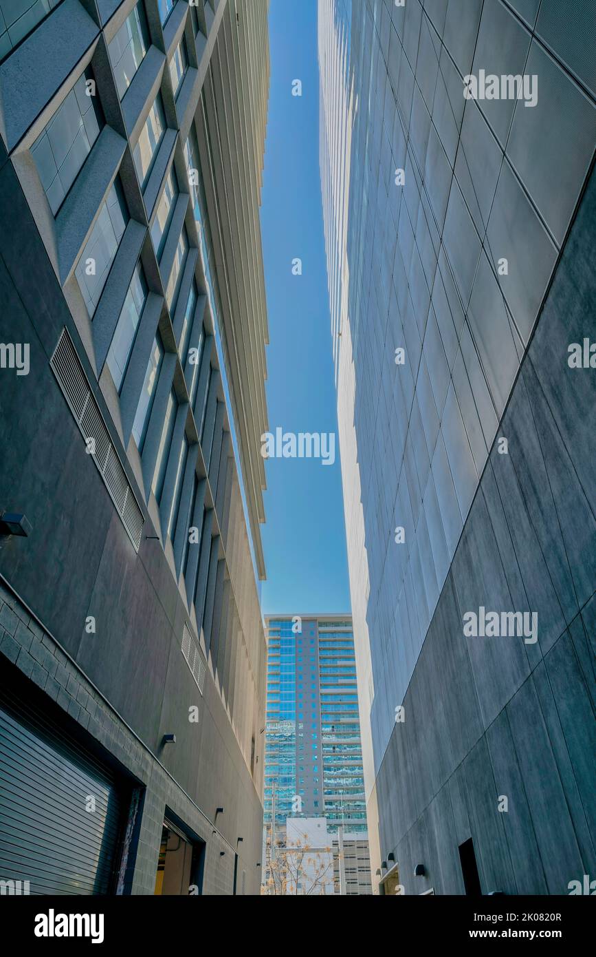 Exterior of modern buildings seen from the back alley of Austin Texas ...