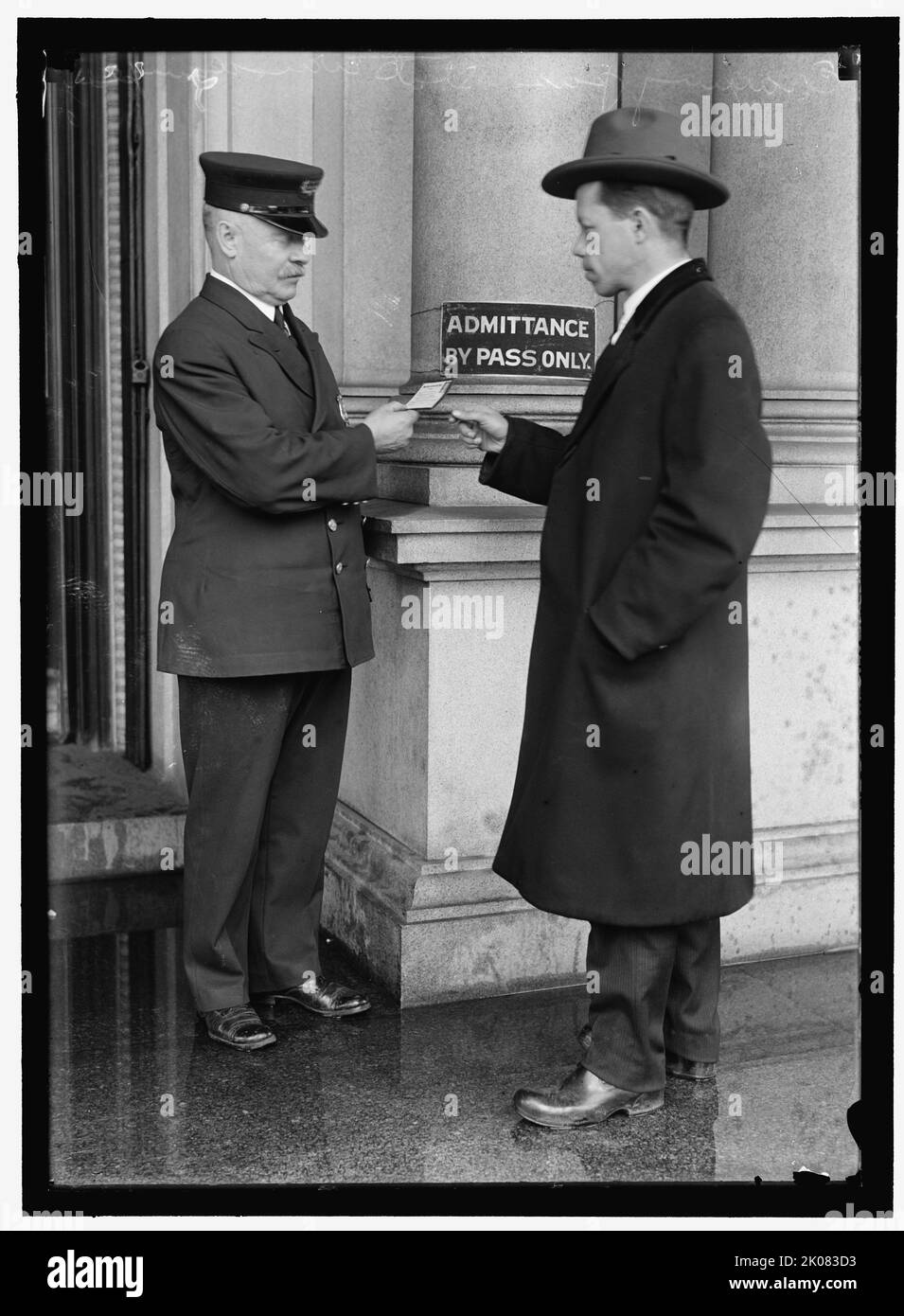 Examining pass at State Department Building, between 1913 and 1918 ...