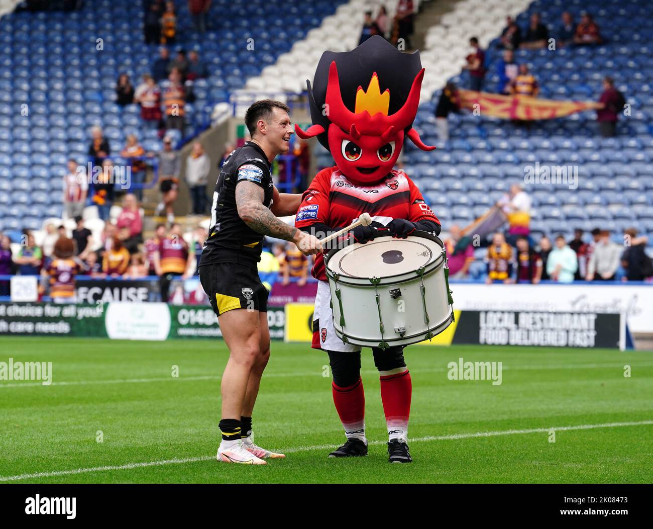 Salford Red Devils' Deon Cross celebrates with mascot Diablo the Devil ...