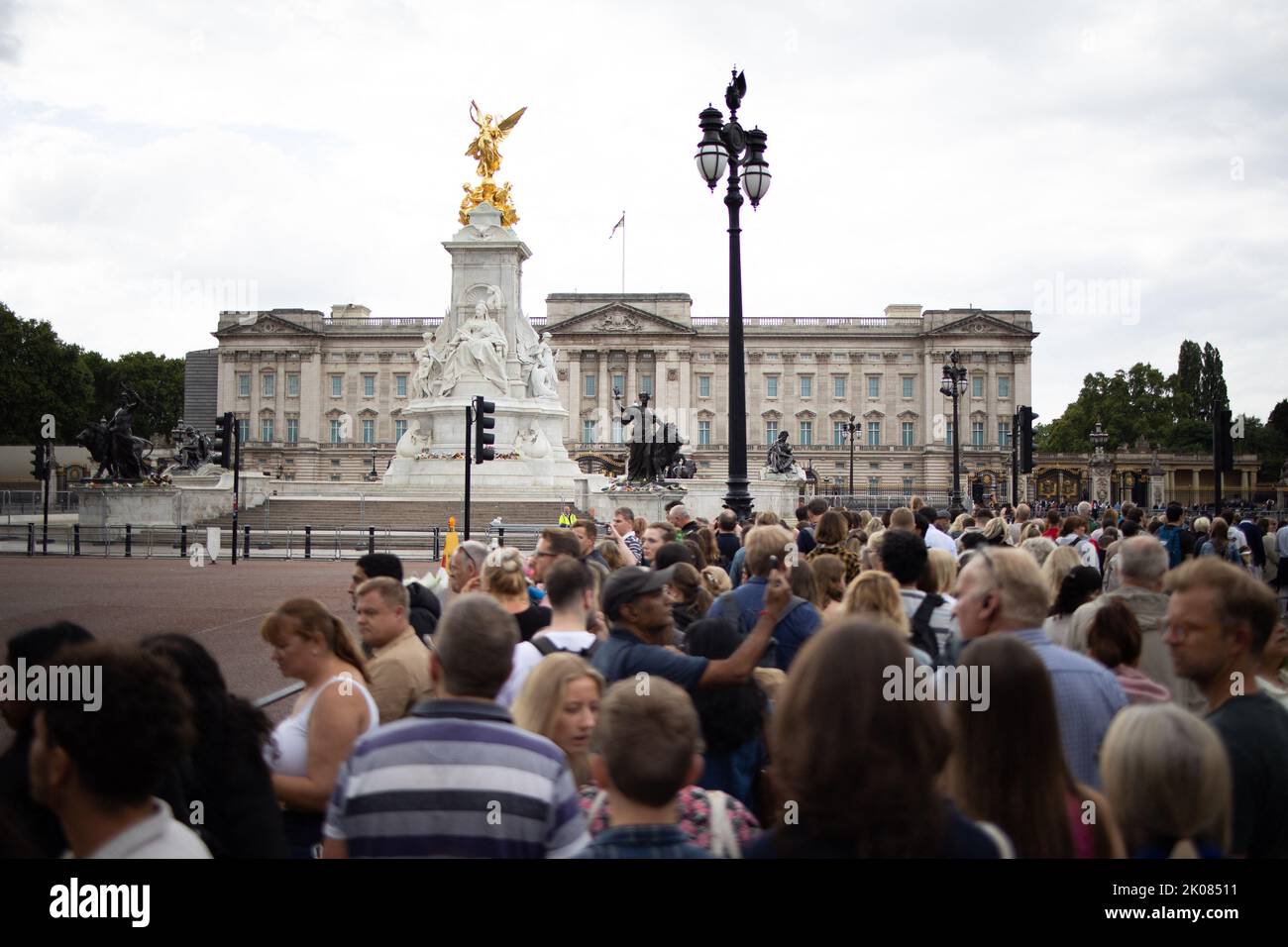 People gather at Buckingham Palace, following the passing of Britain ...