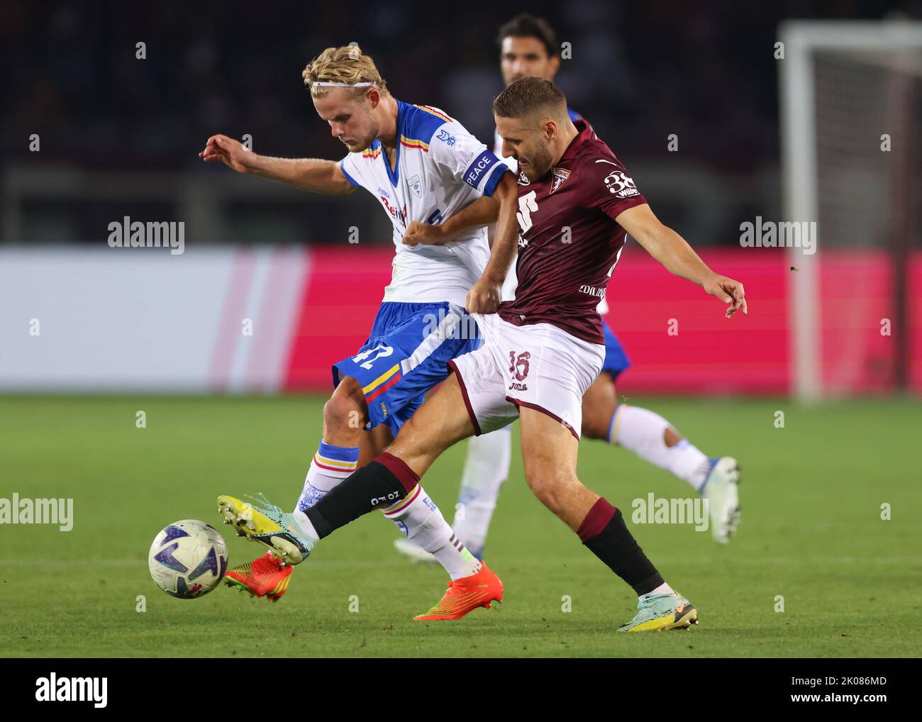 Turin, Italy, 5th September 2022. Nikola Vlasic of Torino FC tussles ...