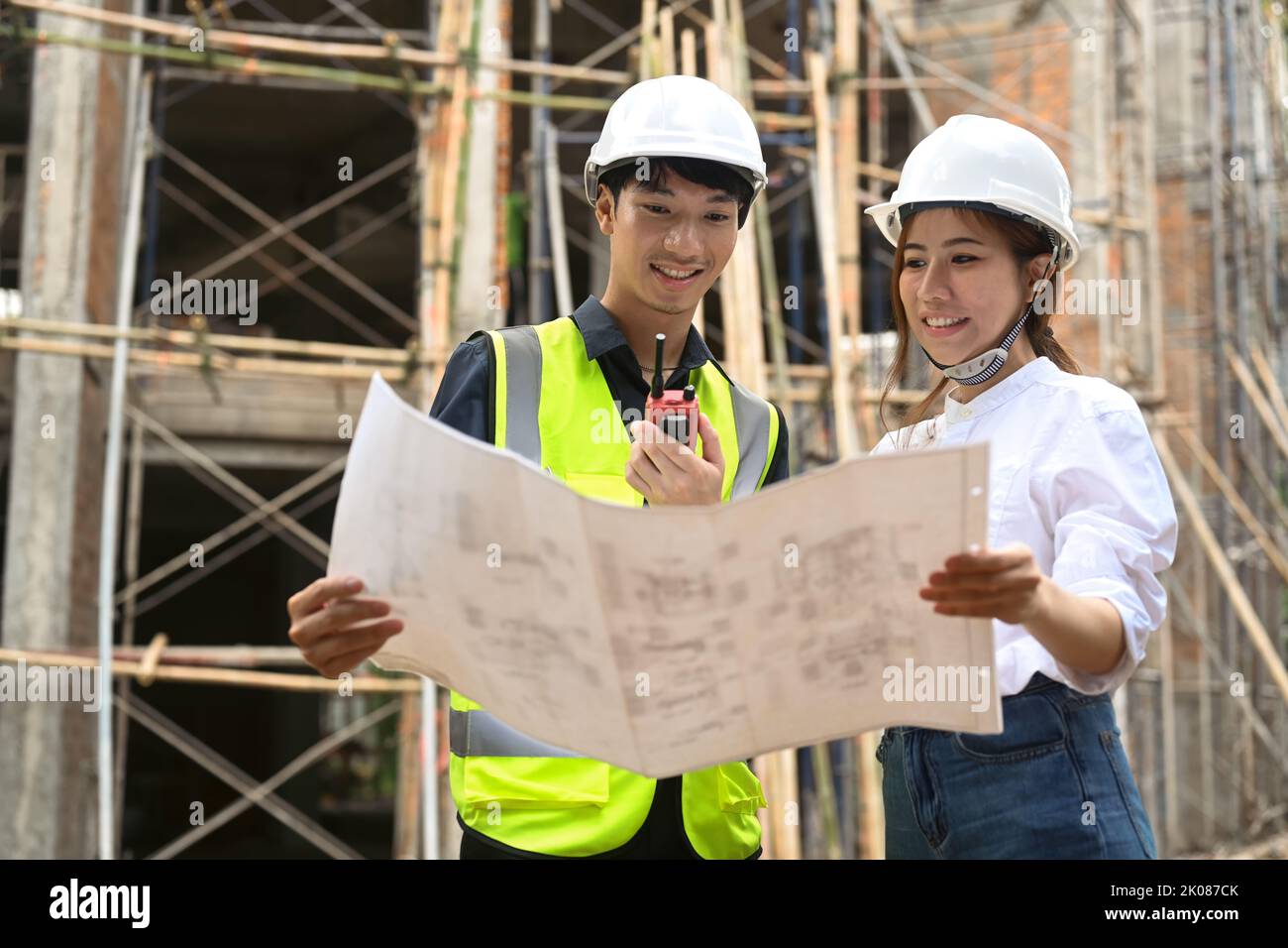 Team of specialists and Civil engineer inspecting industrial building ...