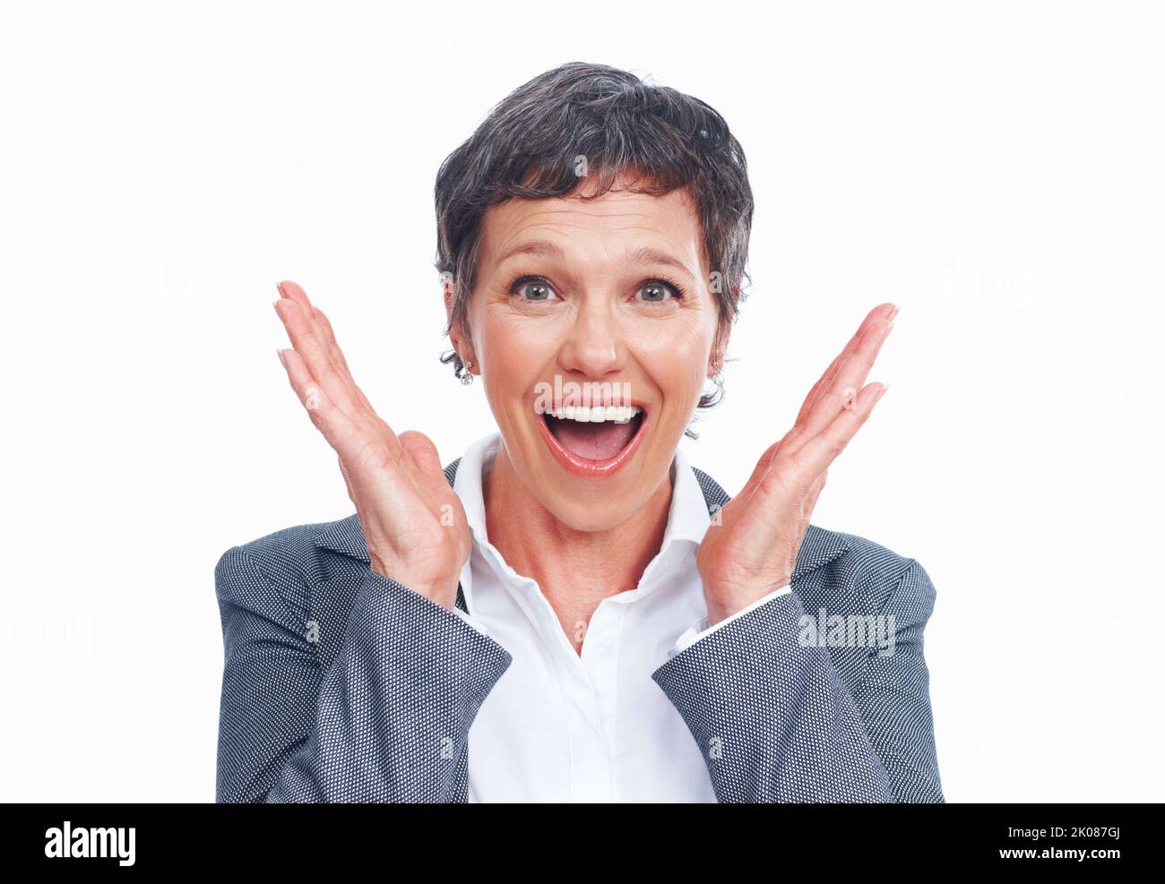 Surprised business woman. Portrait of surprised business woman smiling ...