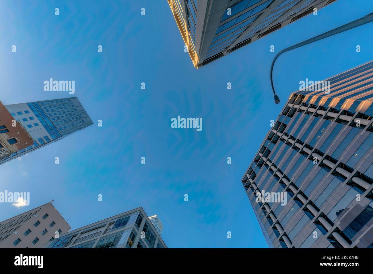 Vibrant blue sky and exterior view of modern houses in downtown Austin ...