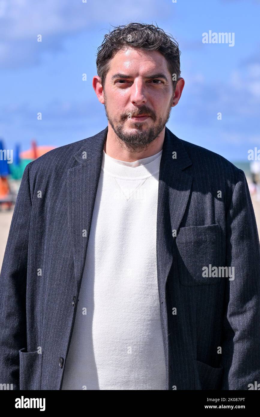 Damien Bonnard attends the photocall of the movie La Grande Magie ...