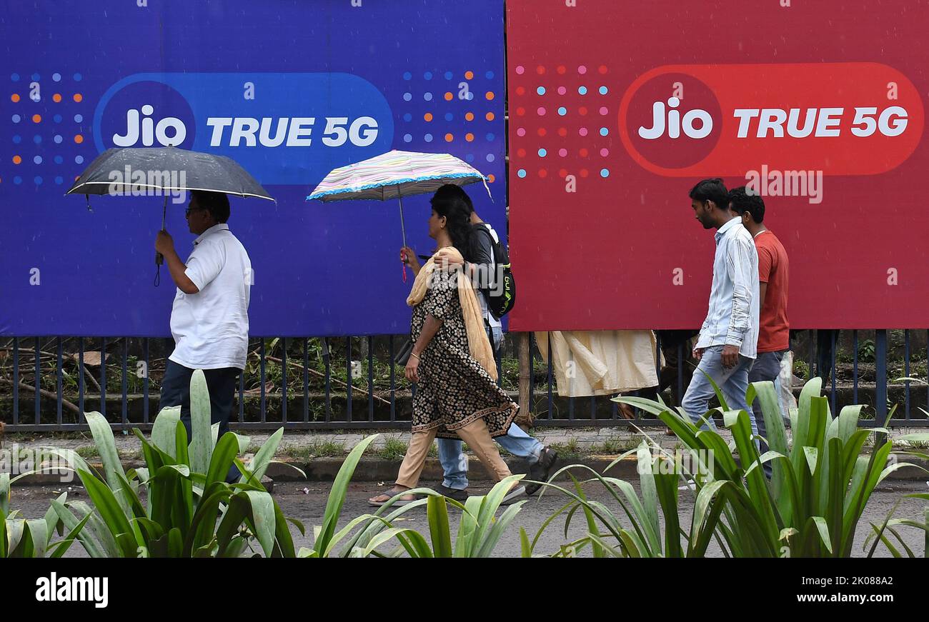 Mumbai, Maharashtra, India. 10th Sep, 2022. People walk past Jio 5G ...