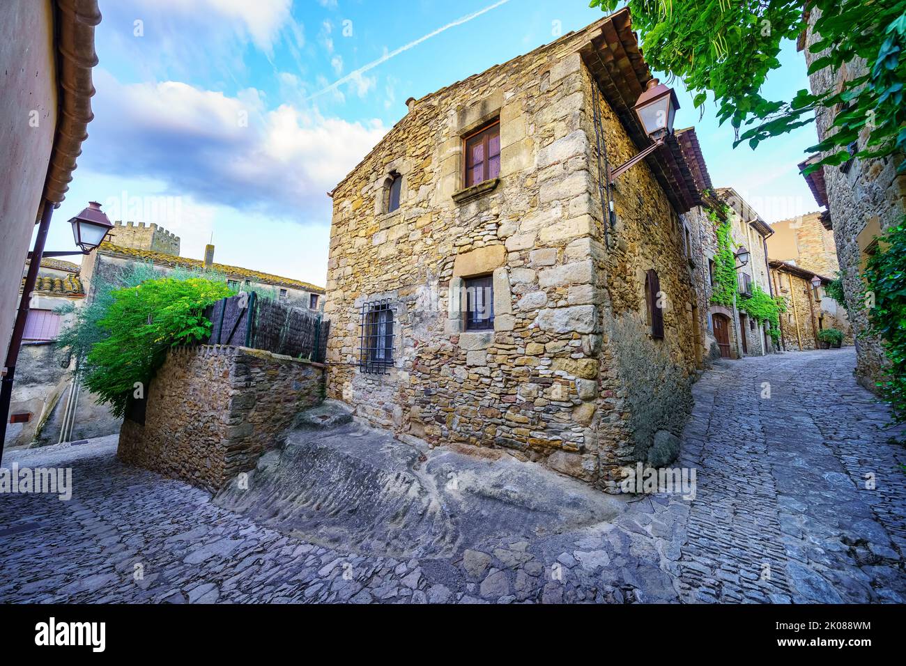 Beautiful stone houses and narrow alleys in the medieval village of ...