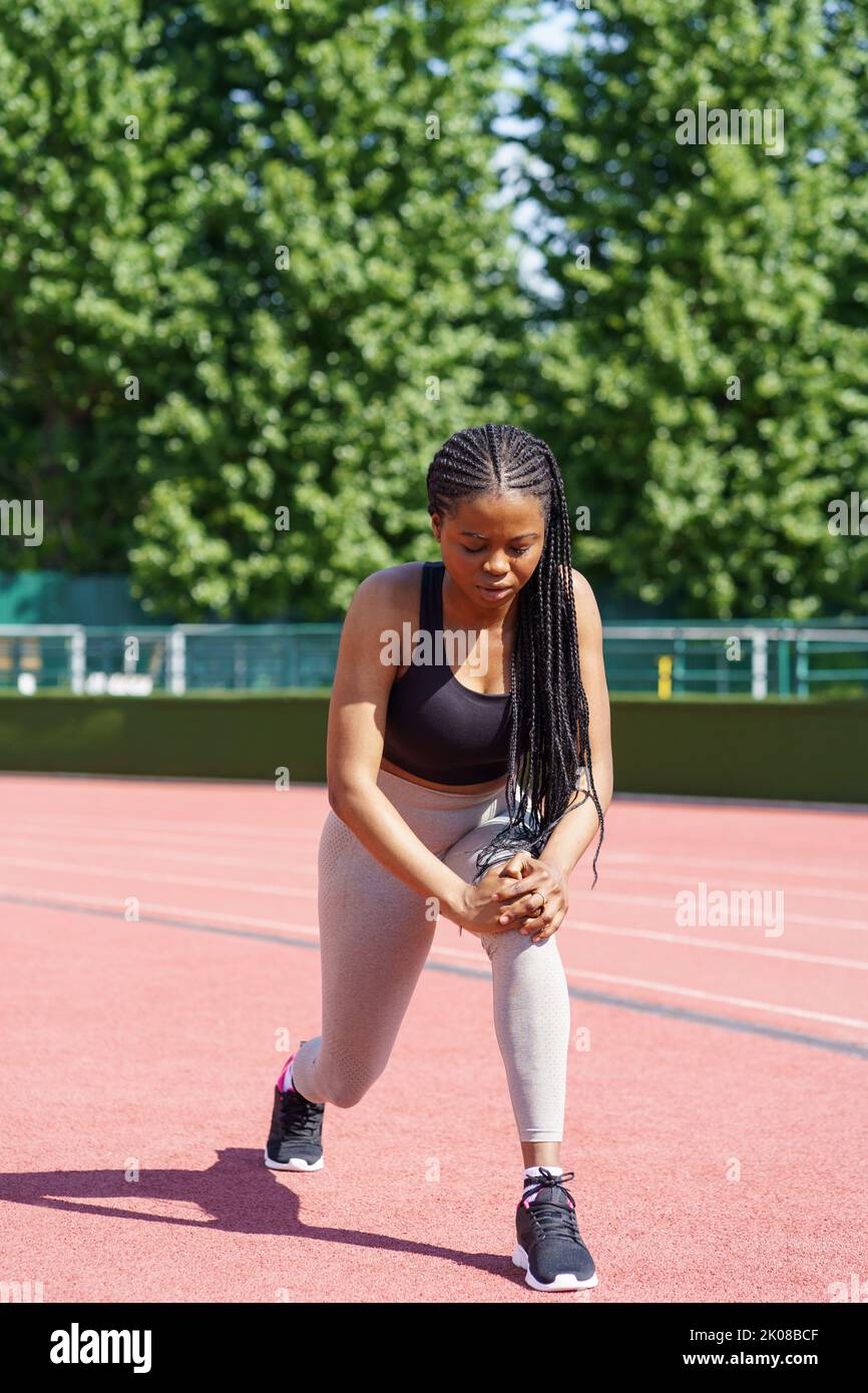 Persistent black woman with long braids tries hard to pump gluteal ...