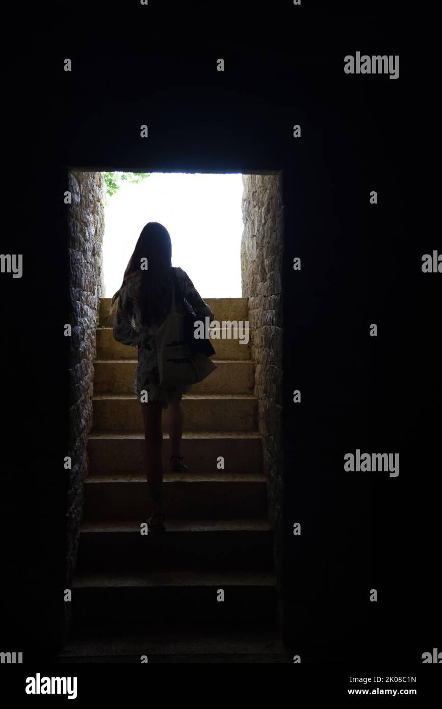 Mysterious Girl Climbing Dark Stairs, Steps or Stairway leading from ...